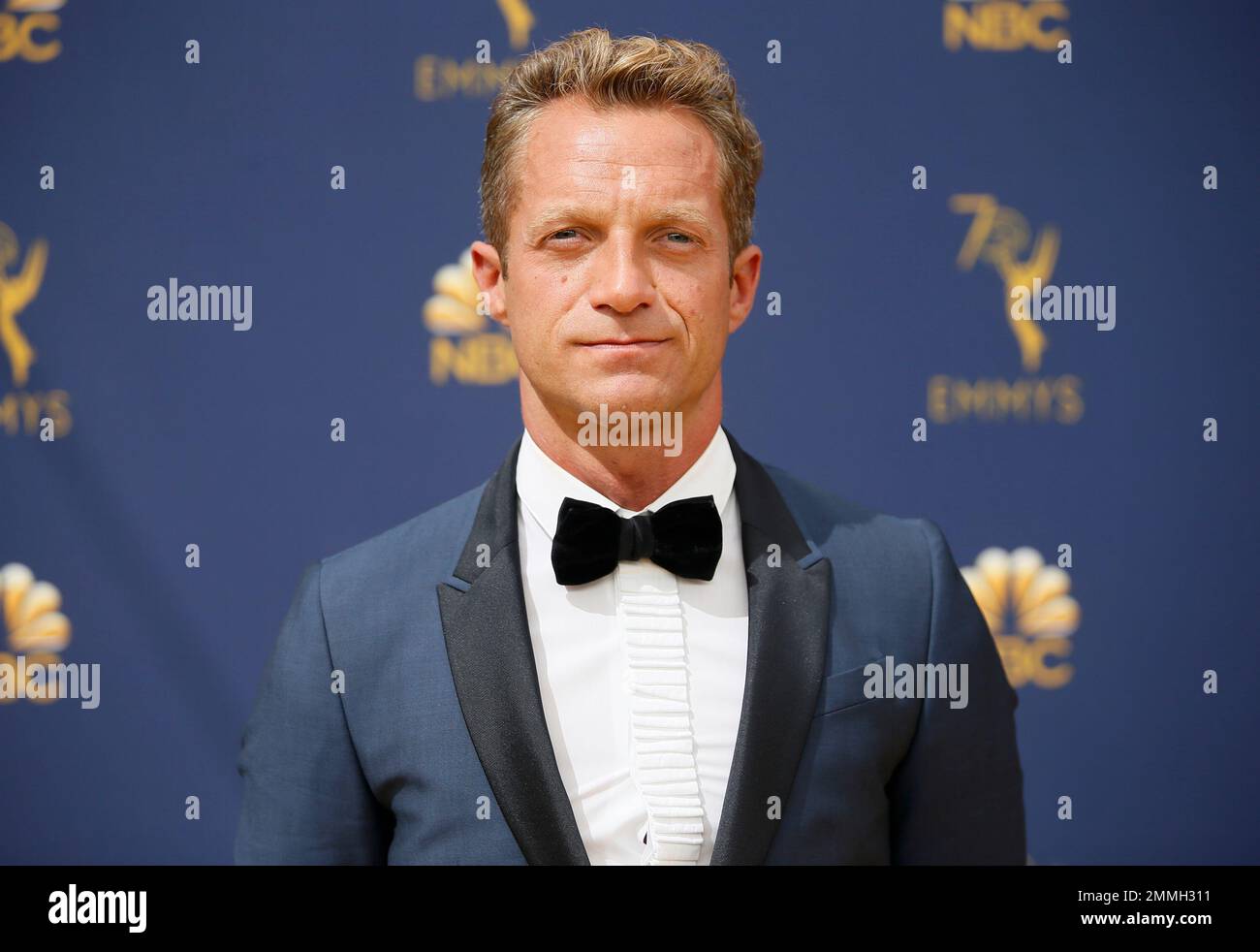 Tom Rob Smith arrives at the 70th Primetime Emmy Awards on Monday, Sept ...