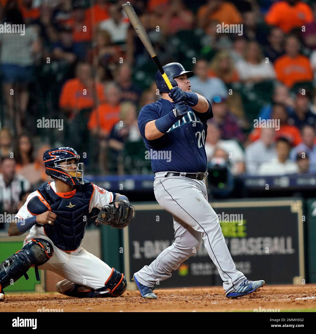 Seattle Mariners' Daniel Vogelbach (20) hits a grand slam as Houston ...