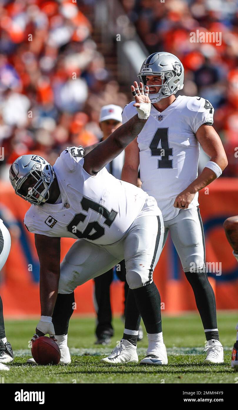 Oakland Raiders center Rodney Hudson (61) signals before snapping the ...