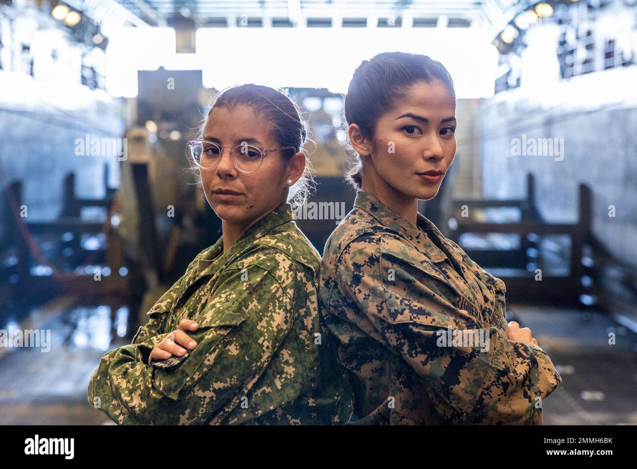 U.S. Marine Corps Lance Cpl. Charisse Briguera, right, a rifle Marine ...