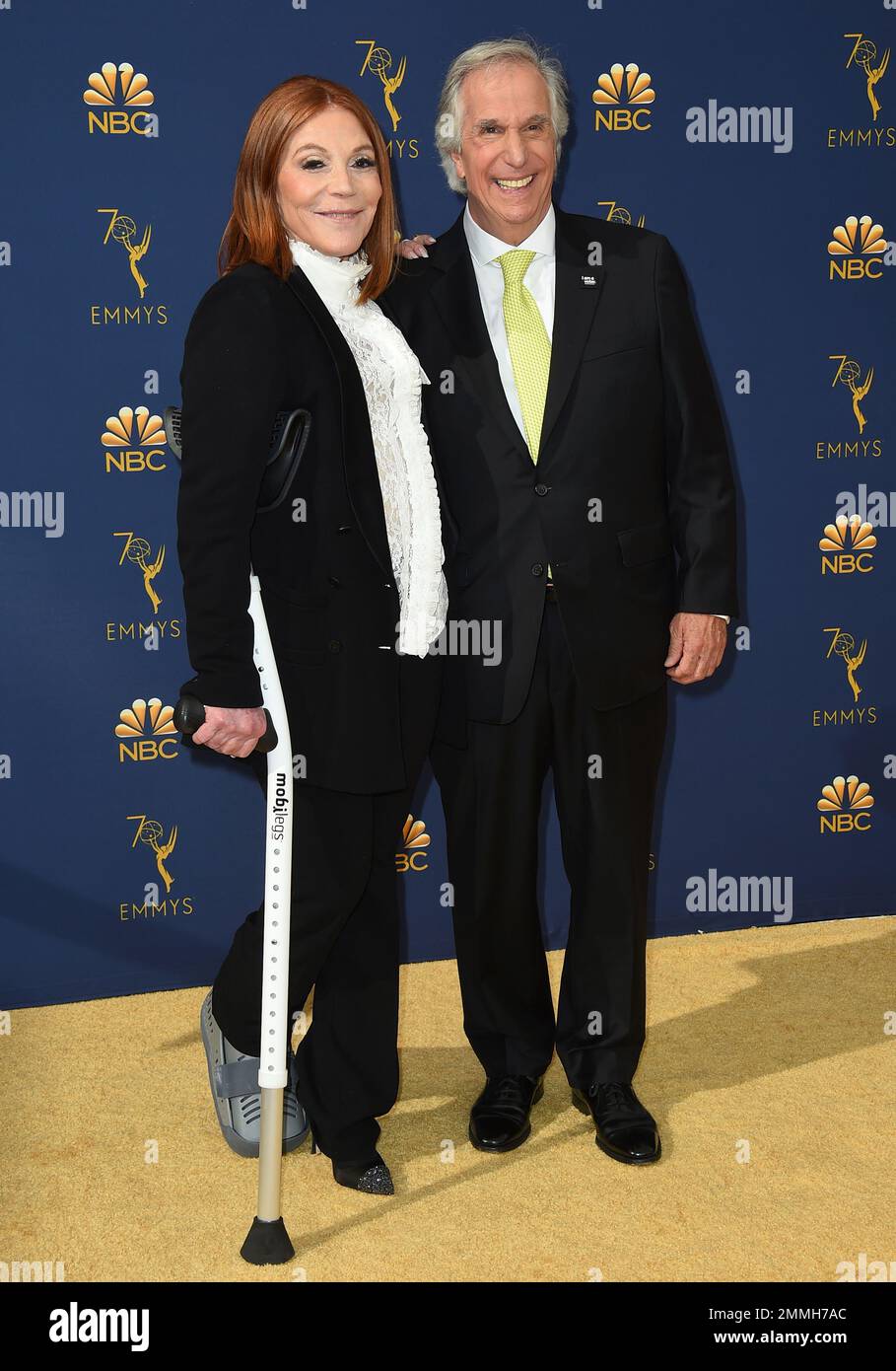 Stacey Weitzman, left, and Henry Winkler arrive at the 70th Primetime ...