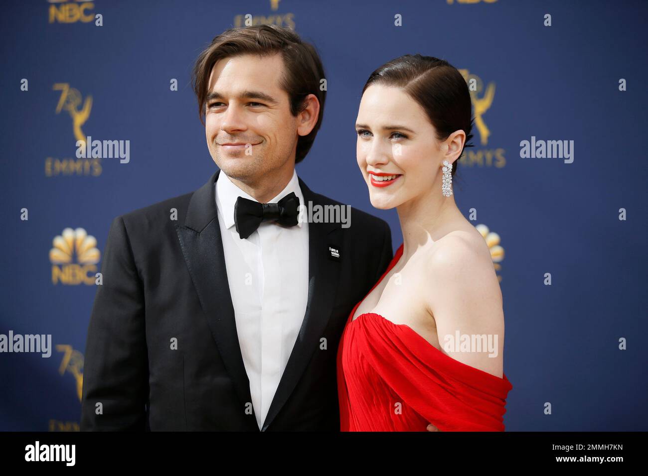 Jason Ralph, left, and Rachel Brosnahan arrive at the 70th Primetime ...