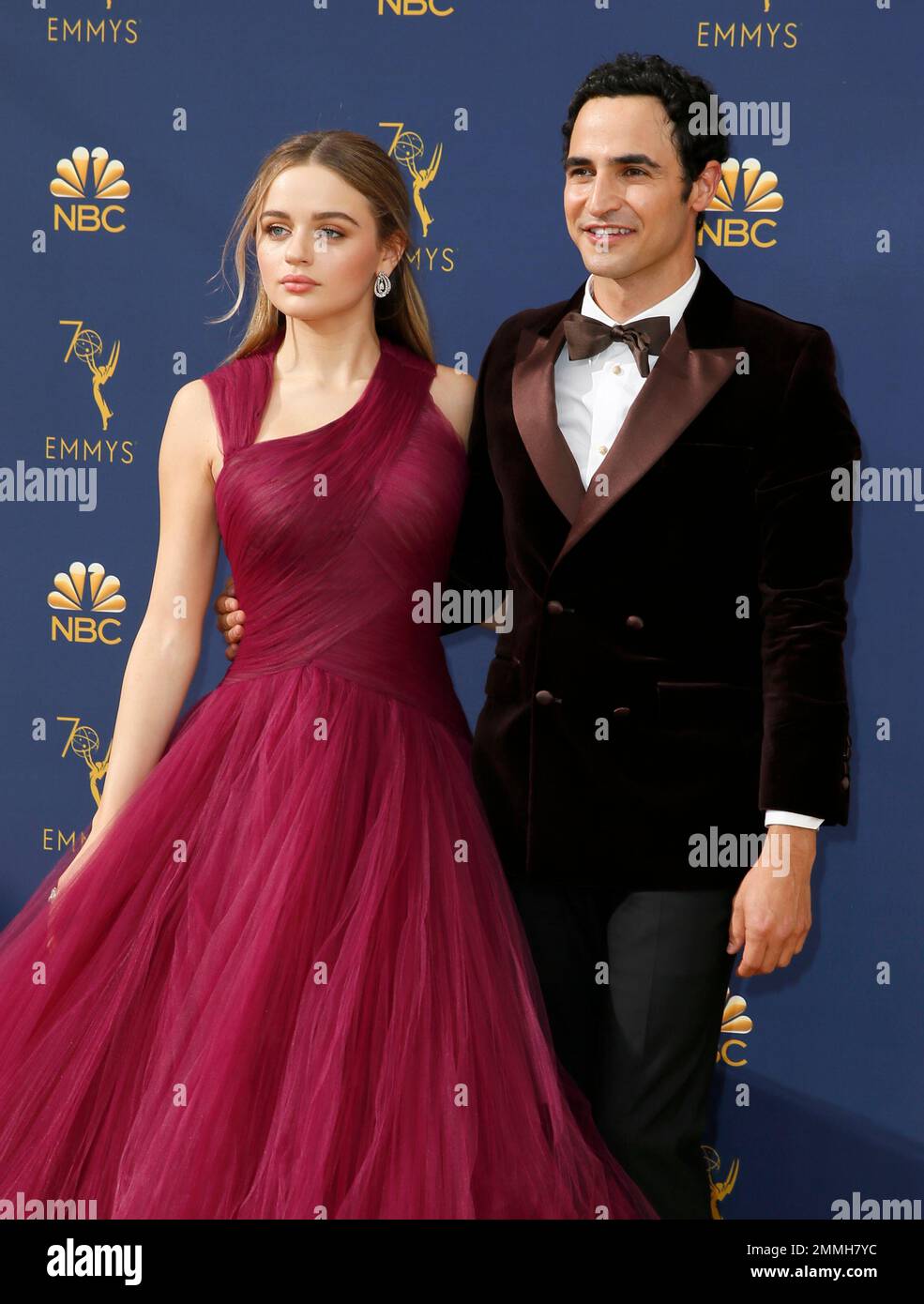 Joey King, left, and Zac Posen arrive at the 70th Primetime Emmy Awards ...