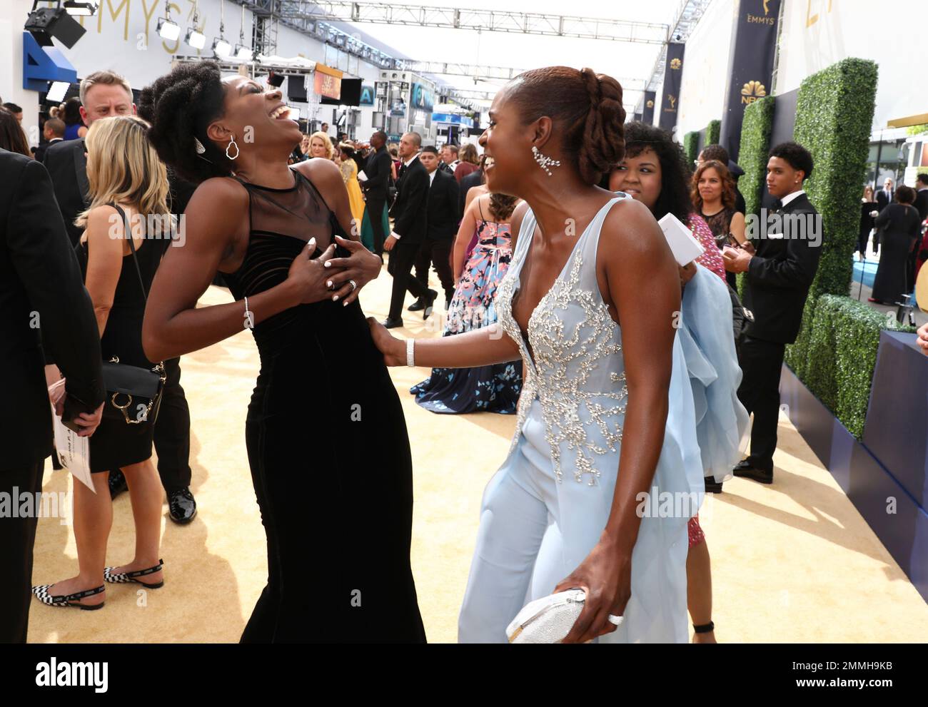 Yvonne Orji, left and Issa Rae arrive at the 70th Primetime Emmy Awards ...