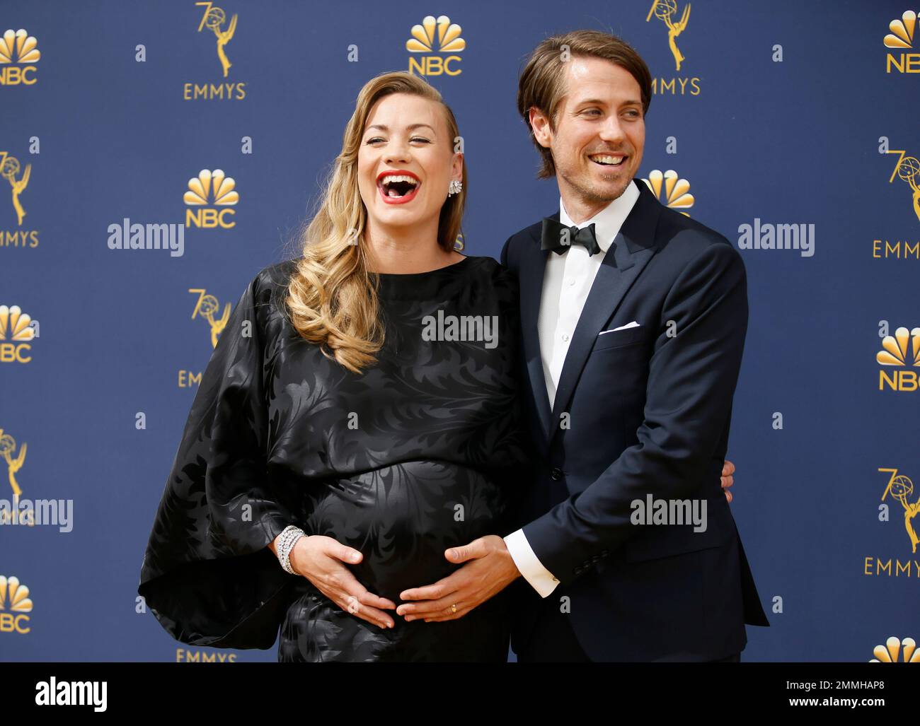 Yvonne Strahovski, left, and Tim Loden arrive at the 70th Primetime ...