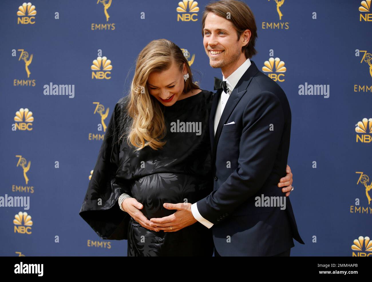 Yvonne Strahovski, left, and Tim Loden arrive at the 70th Primetime ...