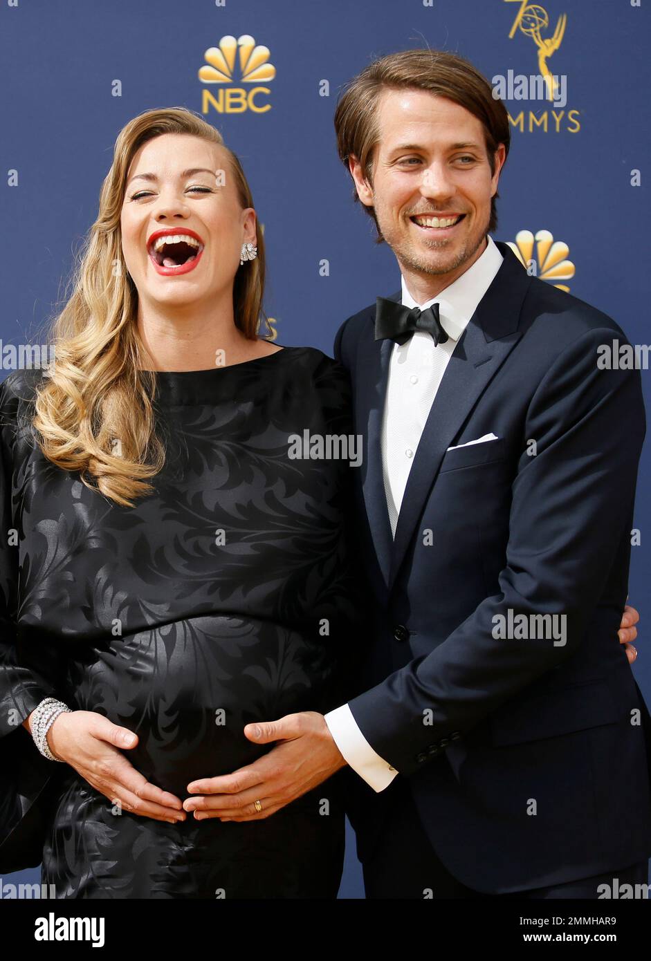 Yvonne Strahovski, left, and Tim Loden arrive at the 70th Primetime ...