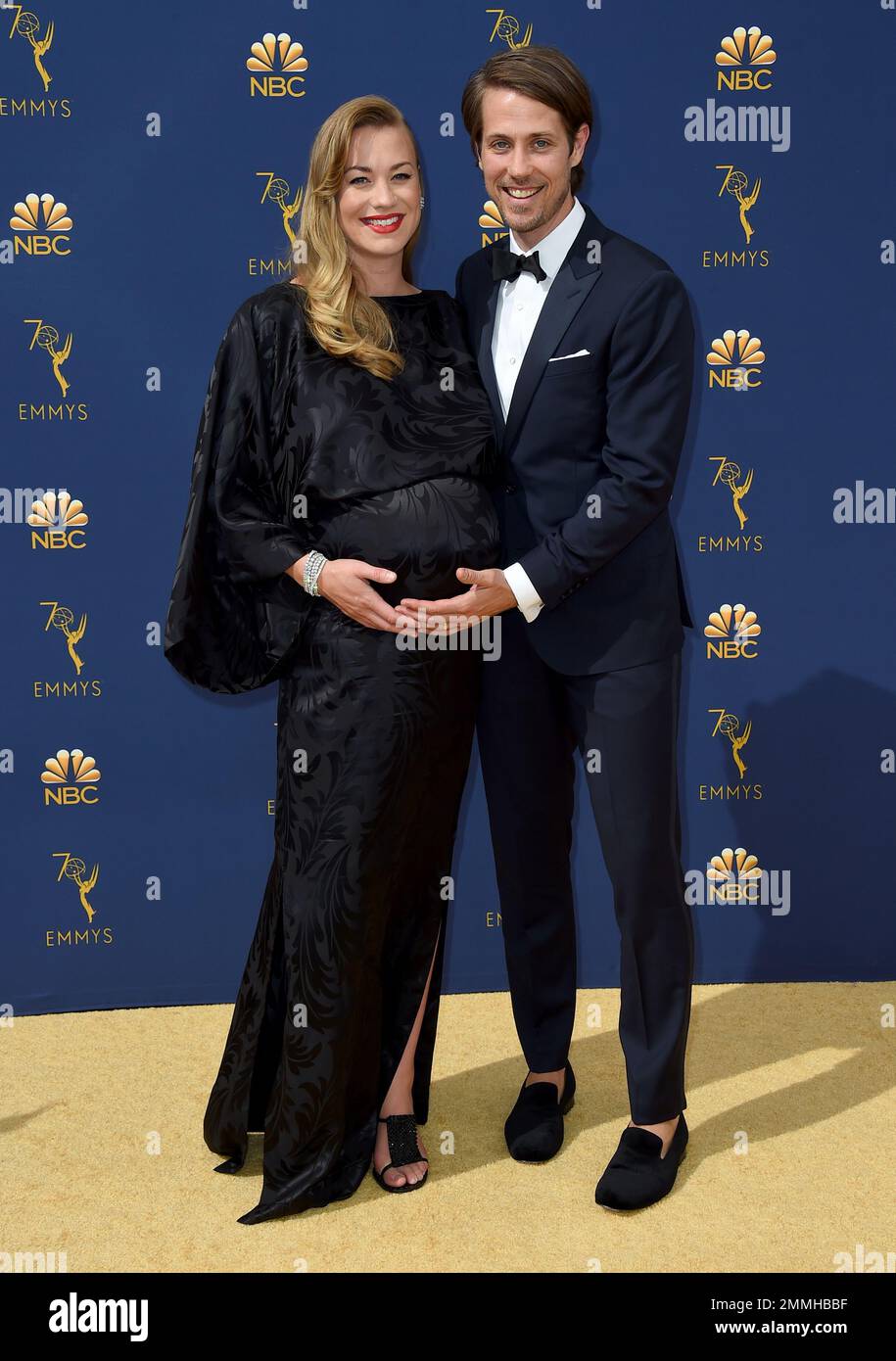 Yvonne Strahovski, left, and Tim Loden arrive at the 70th Primetime ...