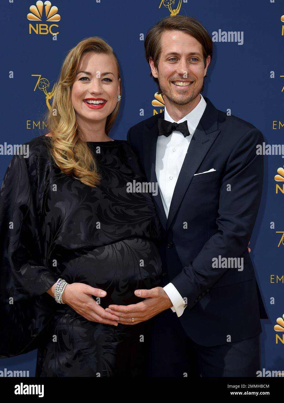 Yvonne Strahovski, left, and Tim Loden arrive at the 70th Primetime ...