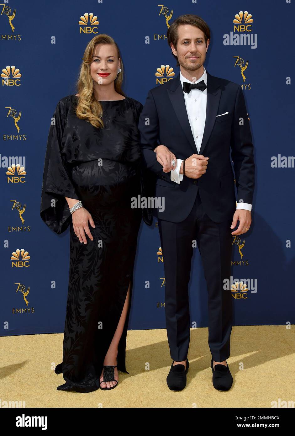 Yvonne Strahovski, left, and Tim Loden arrive at the 70th Primetime ...