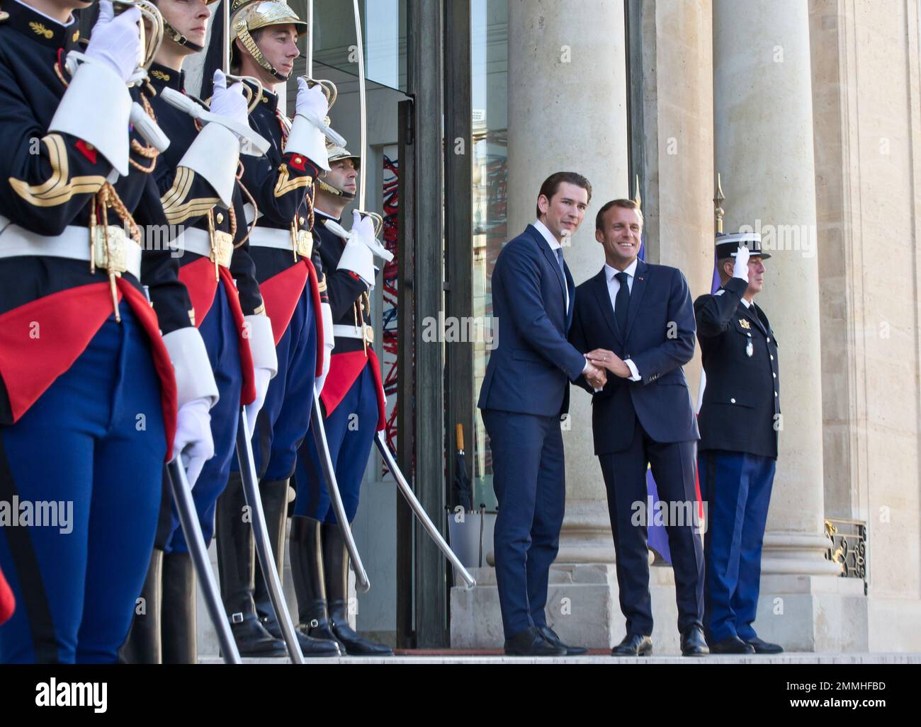 Austrian Chancellor Sebastian Kurz, left, is welcomed by French ...