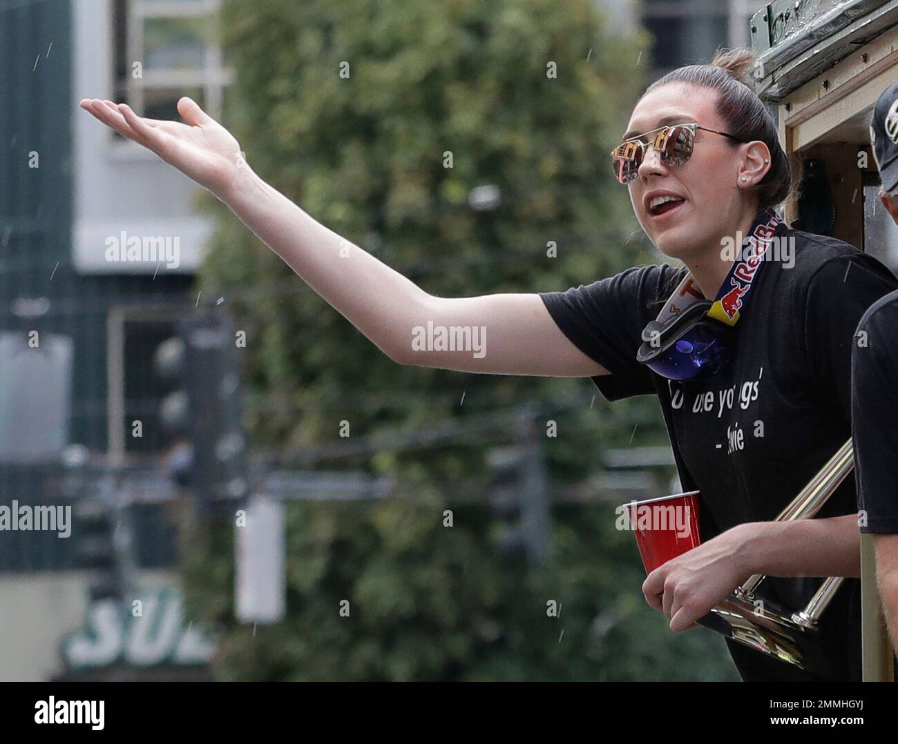 Seattle Storm forward Breanna Stewart reacts out to feel rain drops ...