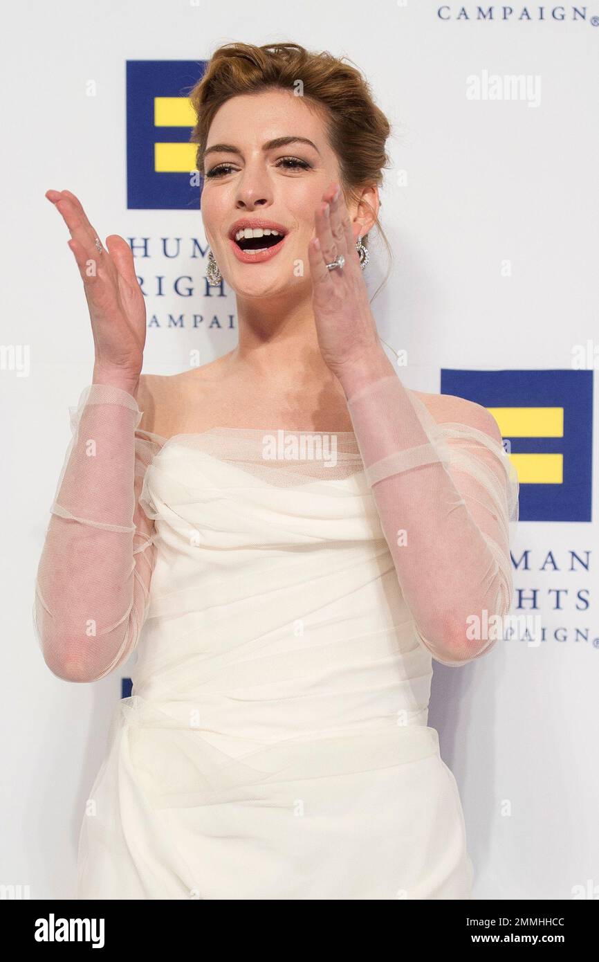 Actress Anne Hathaway Poses For Photographers Upon Her Arrival At The