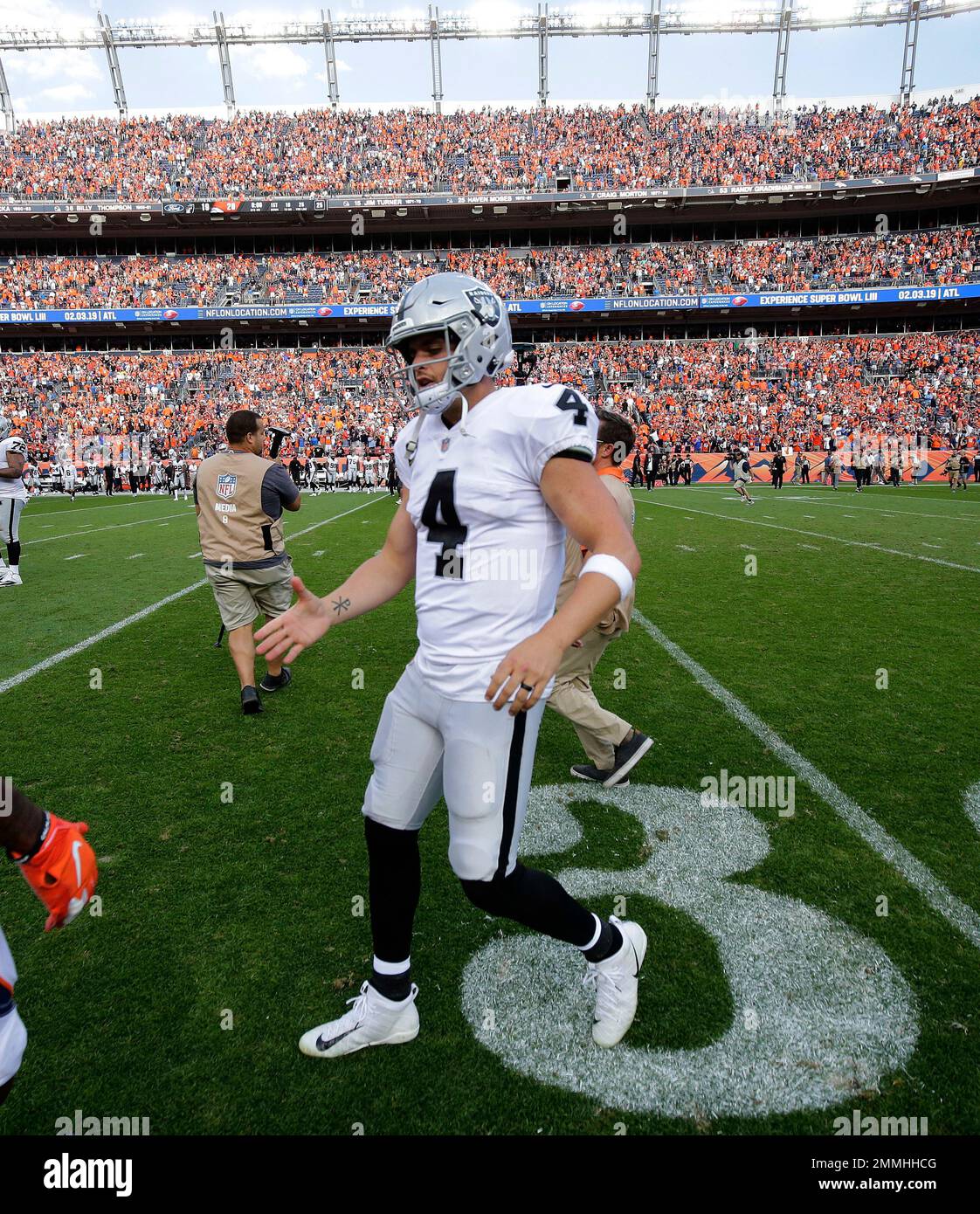 Oakland Raiders quarterback Derek Carr (4) leaves the field after an ...