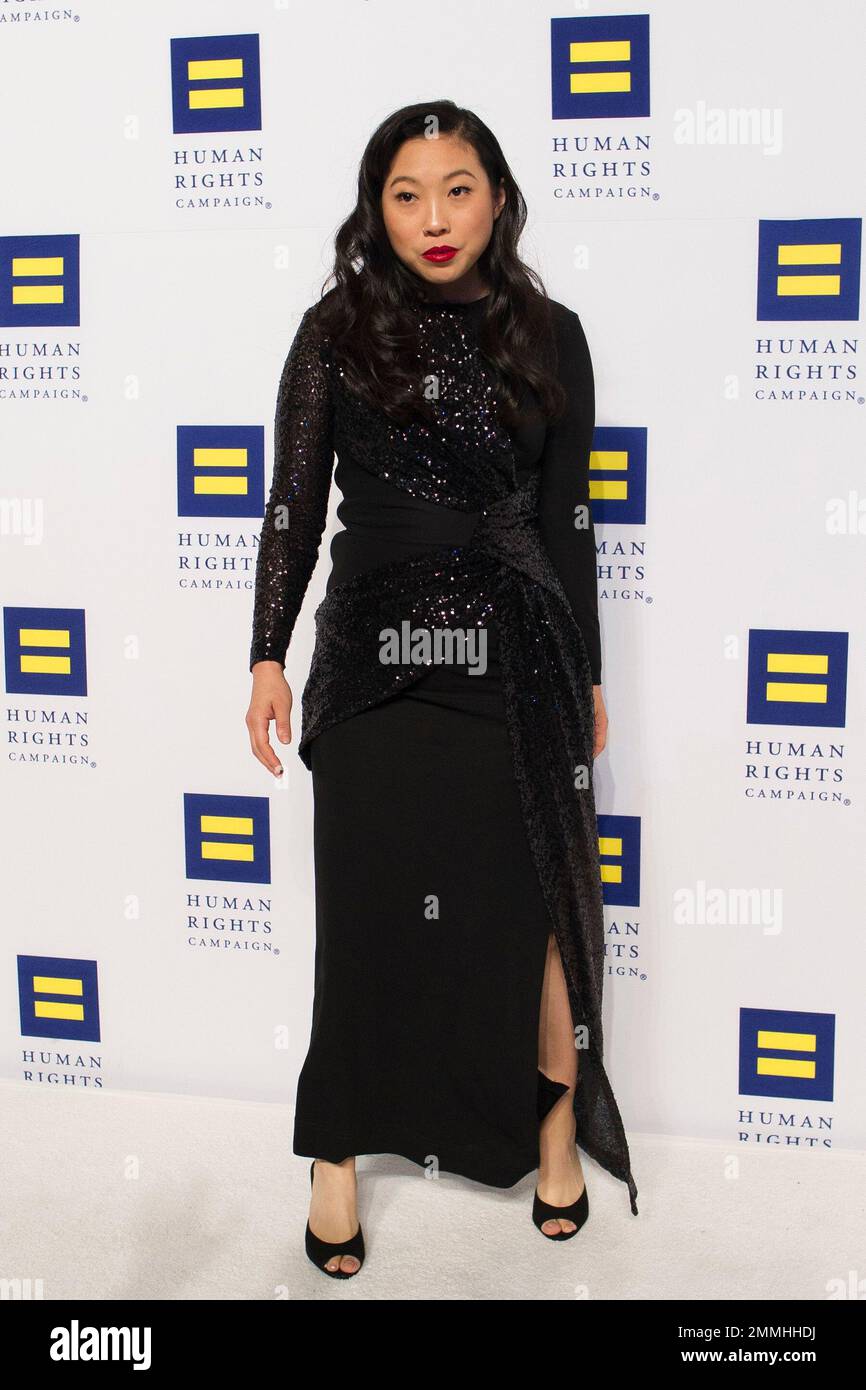 Actress Awkwafina poses for photographers upon arriving at the Human ...