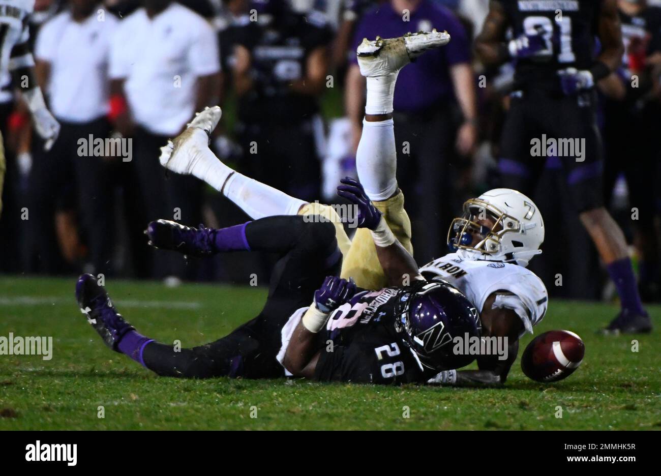 Akron defensive back Jordan George (7) breaks up a pass meant for ...