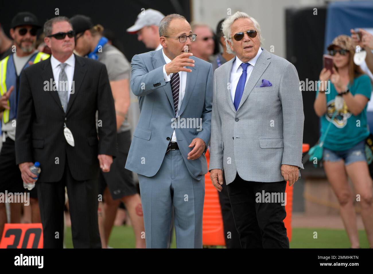 New England Patriots owner Bob Kraft, right, watches warmups before an ...