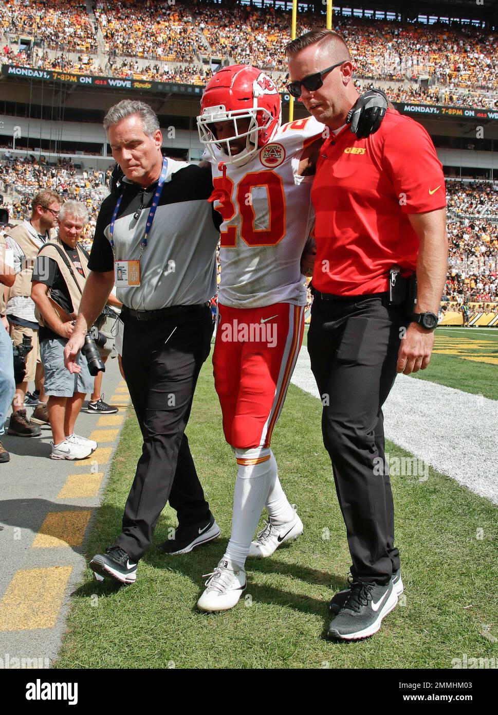 Kansas City Chiefs cornerback Steven Nelson (20) is helped from the ...
