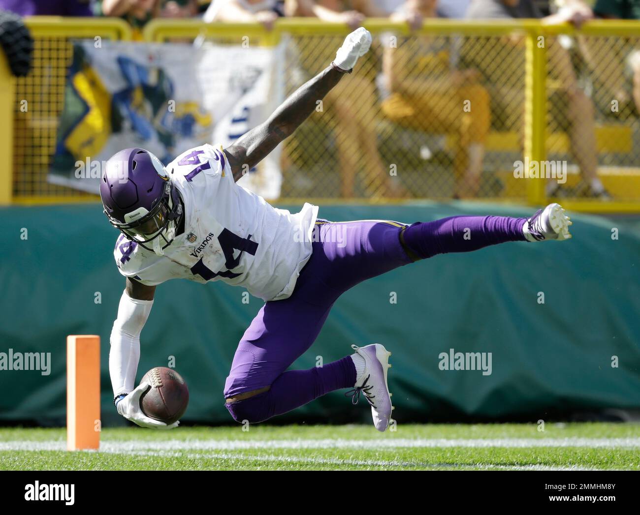 Minnesota Vikings' Stefon Diggs catches a 75-yard touch pass during the ...