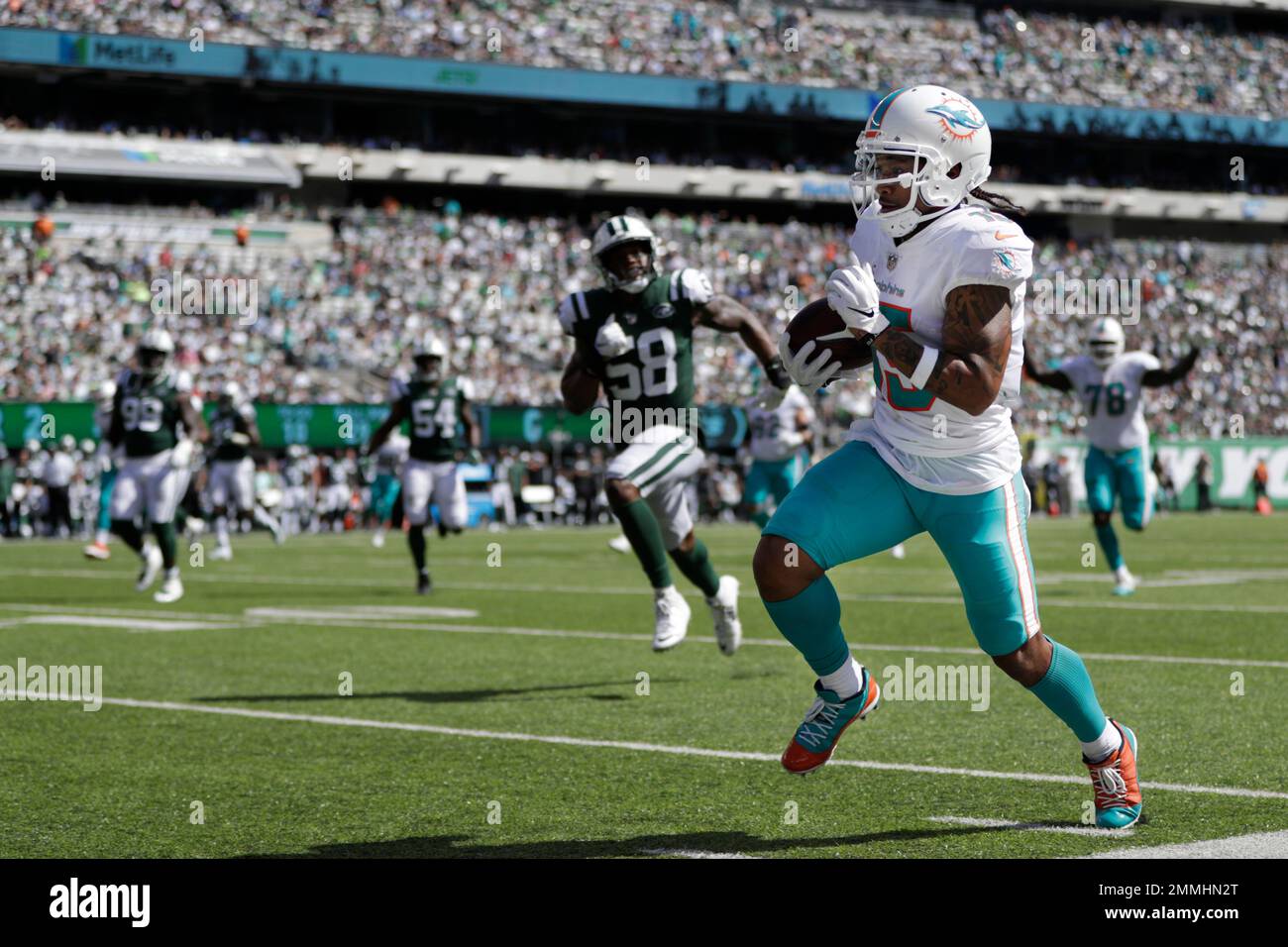 Miami Dolphins' Albert Wilson (15) runs for a touchdown during the ...