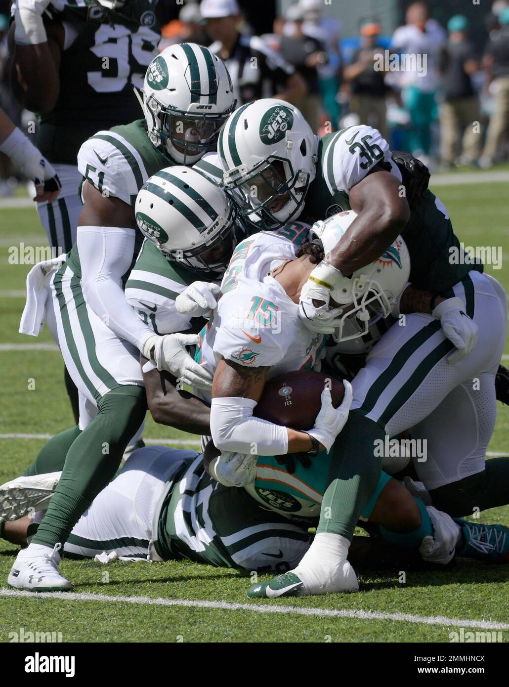 New York Jets' Doug Middleton (36), -Brandon Copeland (51) and Darron ...