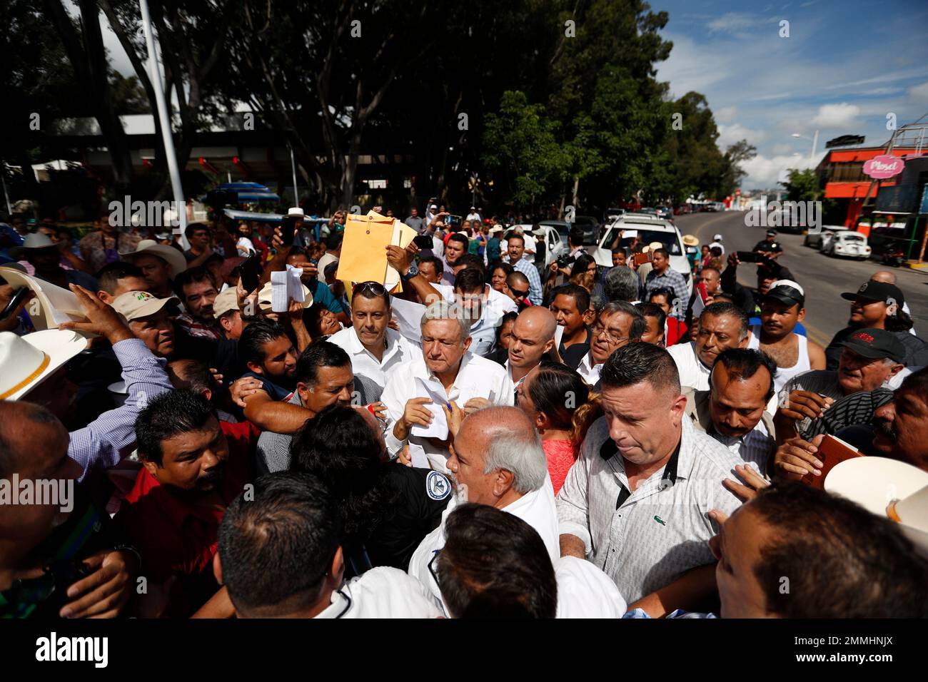 Mexican President-elect Andres Manuel Lopez Obrador is surrounded by ...