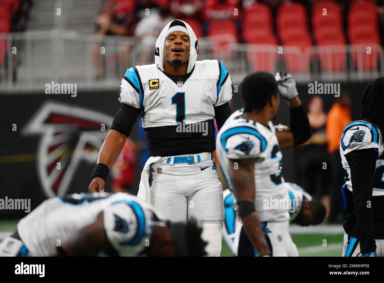 Carolina Panthers quarterback Cam Newton (1) warms up with the team ...