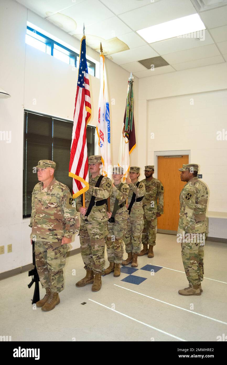 A color guard led by Staff Sgt. Ronelus (right), of the 394th Field ...