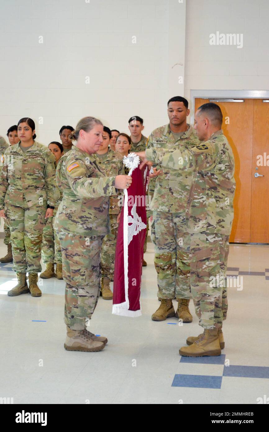 Col. Lisa Patton (left) and Command Sgt. Maj. Miguel Anguiano (right ...