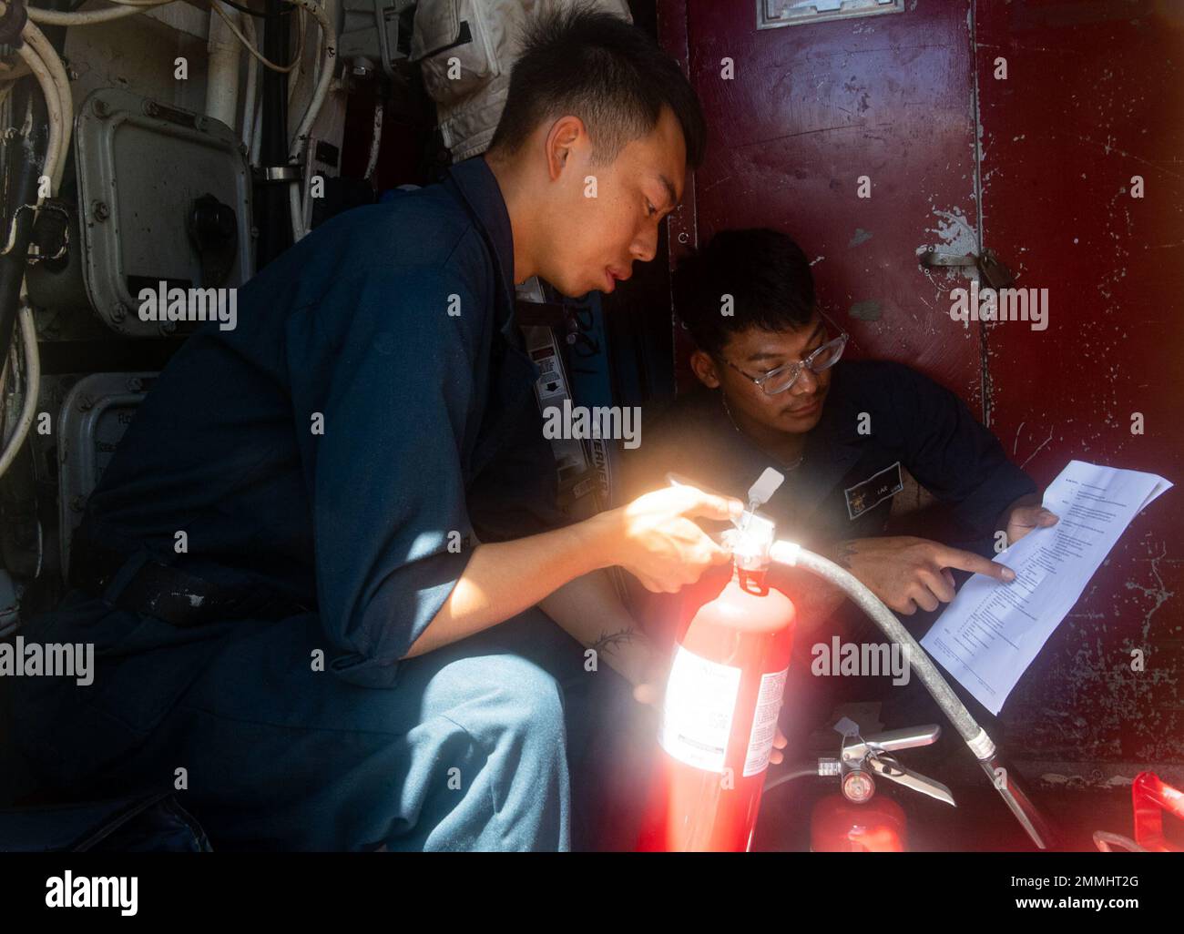 PHILIPPINE SEA (September 19, 2022) Seaman Zhuang Li from Queens, New ...