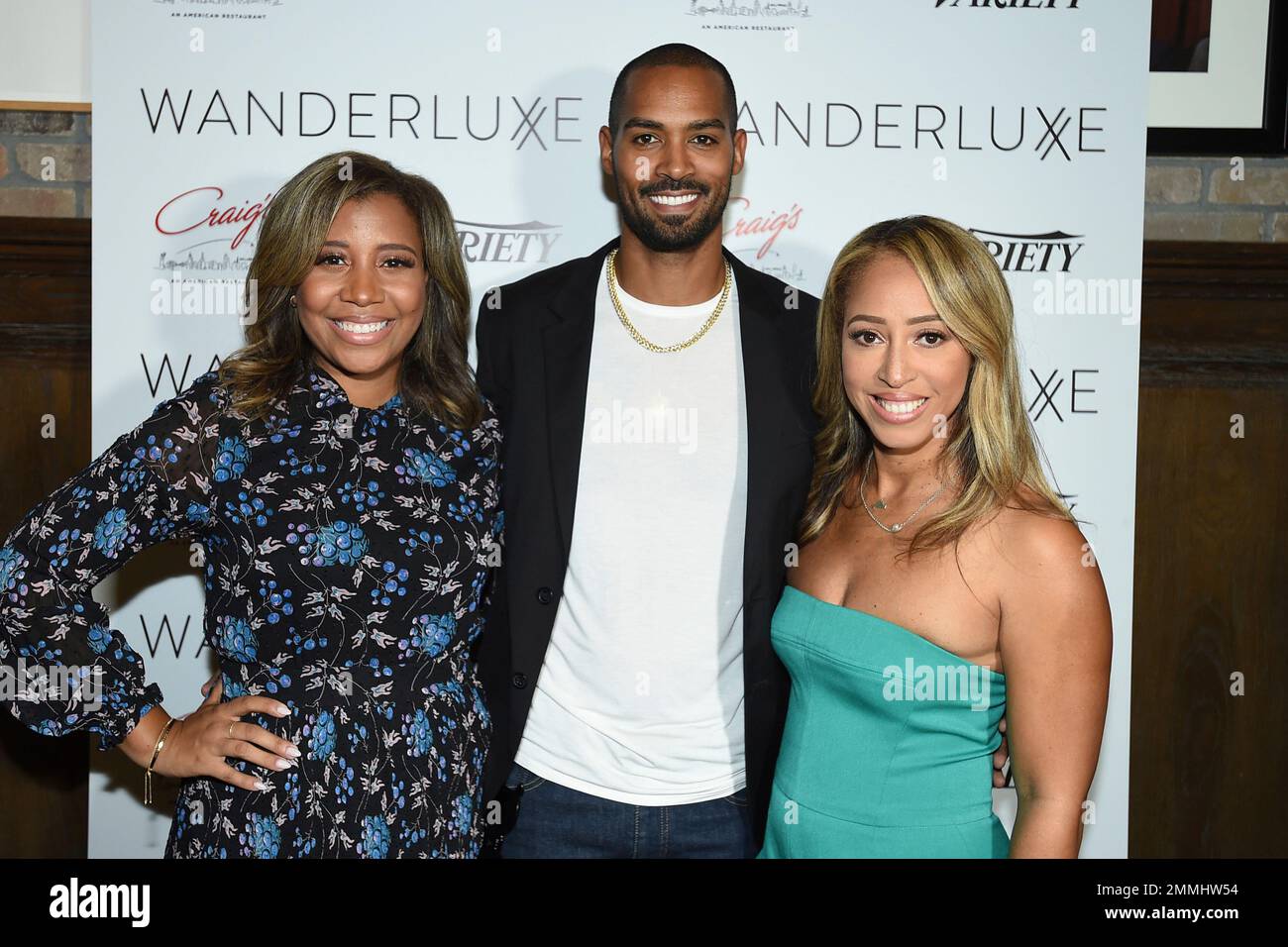Marti Hines, Lamon Archey and Lola Wood attend the WanderLuxxe ...