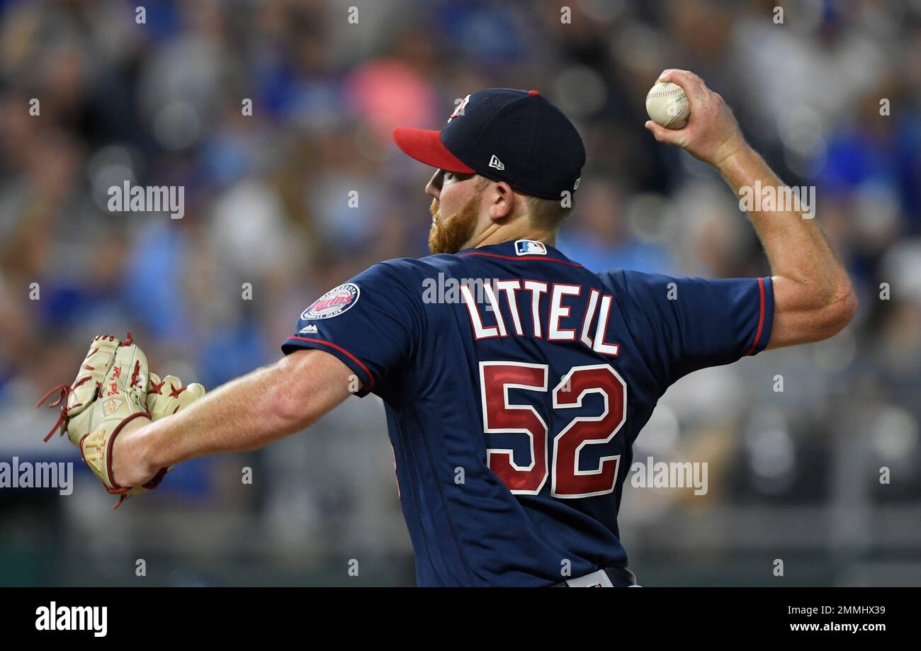 Minnesota Twins relief pitcher Zack Littell throws against the Kansas ...