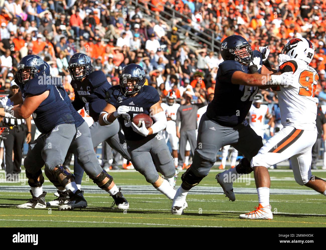 Nevada running back Toa Taua (35) runs for first down in the first ...