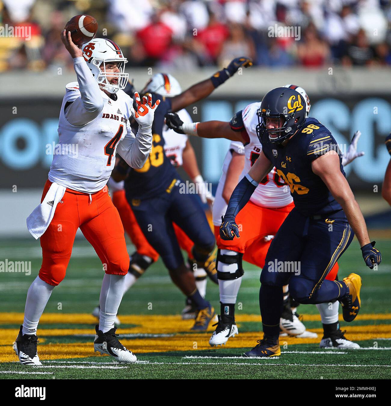 Idaho State quarterback Tanner Gueller passes while under pressure from ...