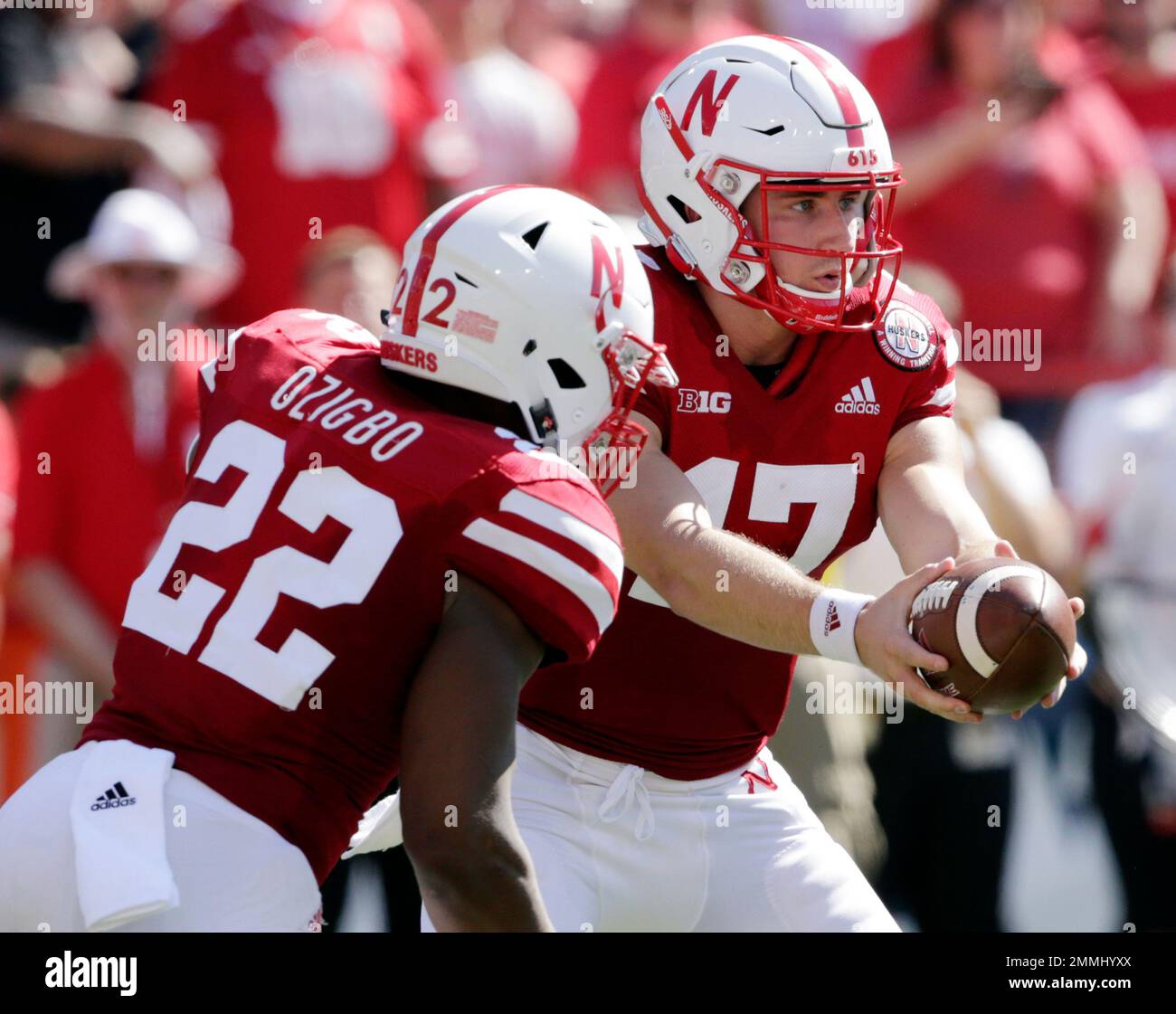 Nebraska quarterback Andrew Bunch (17) hands the ball off to running ...