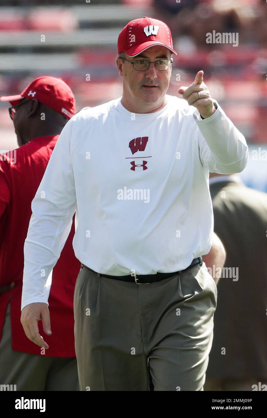 Wisconsin head coach Paul Chryst watches his team warm up before an ...