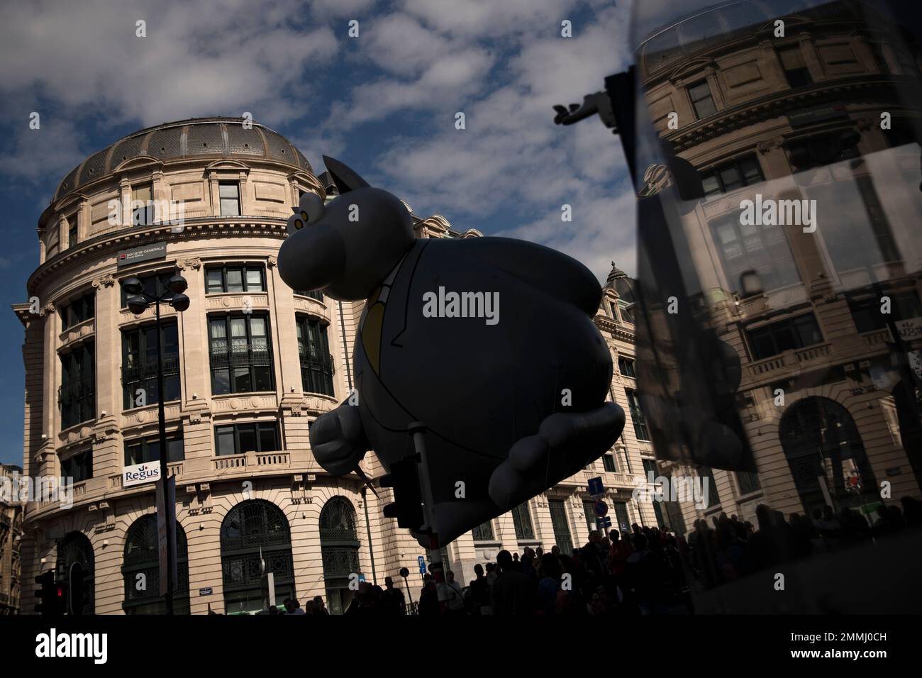 A giant inflated balloon with the shape of a comic strip character ...