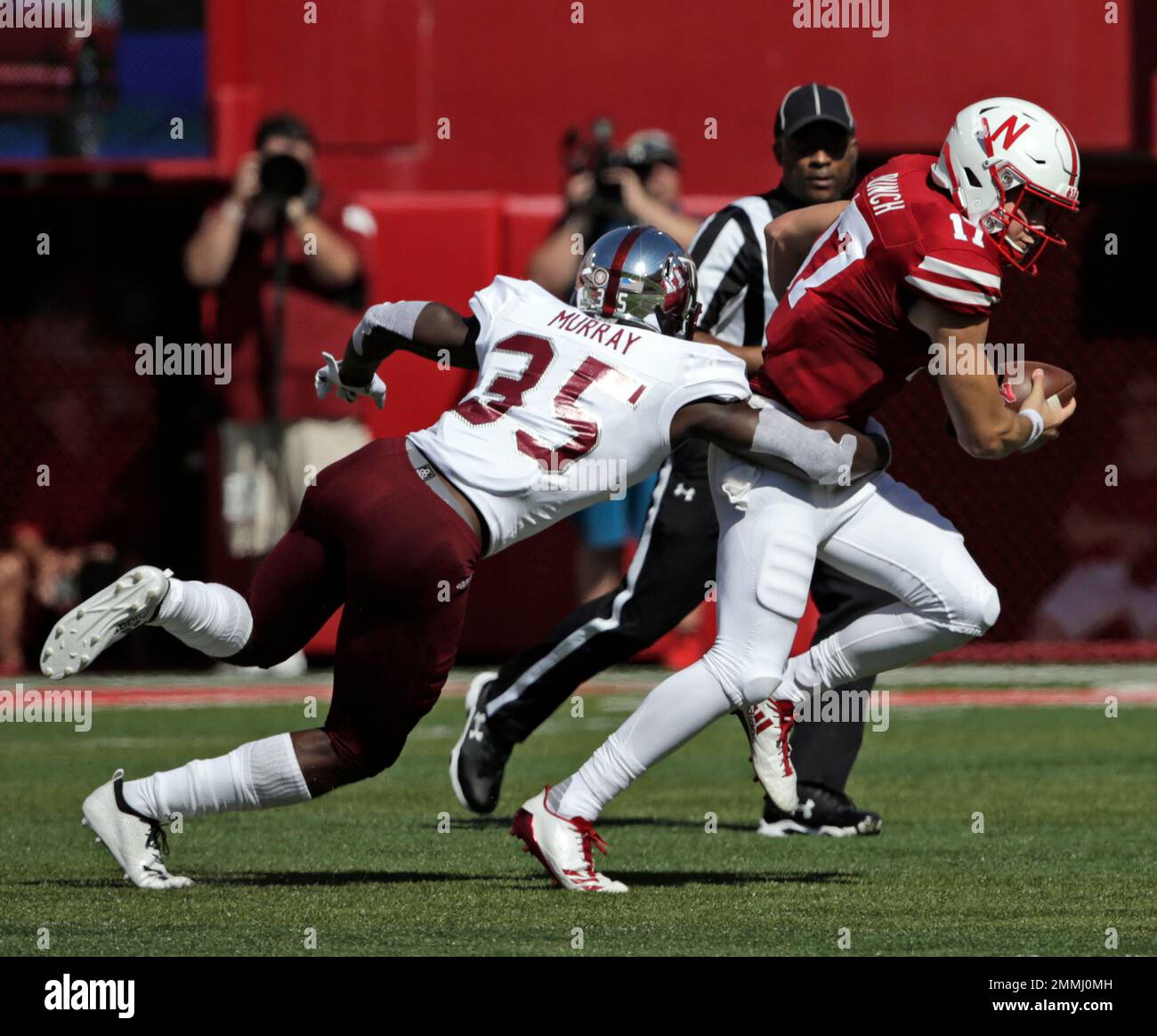 Troy defensive back Tyler Murray (35) sacks Nebraska quarterback Andrew ...