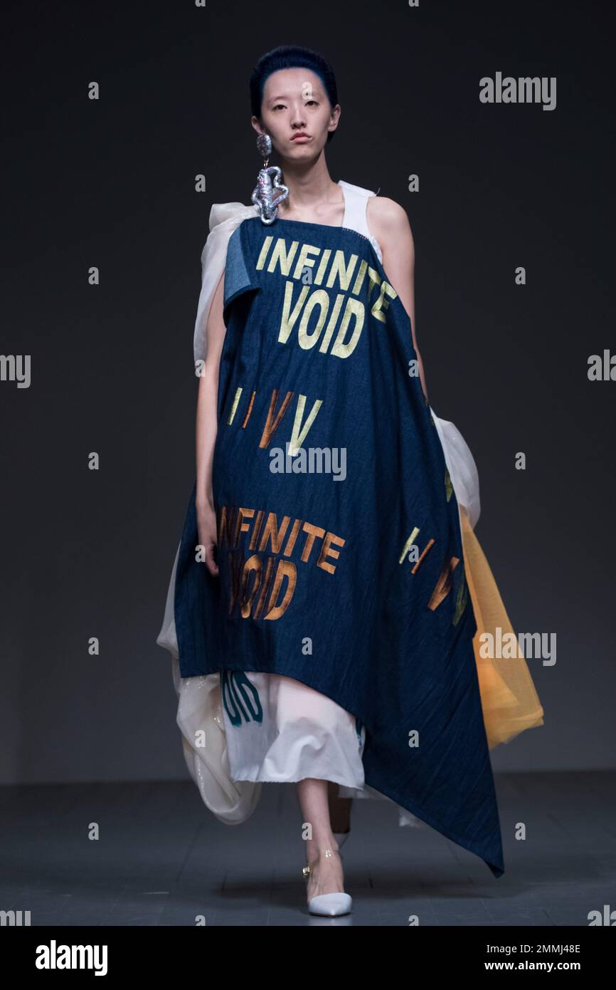 A model wears a creation by designer Matty Bovan during their Spring ...