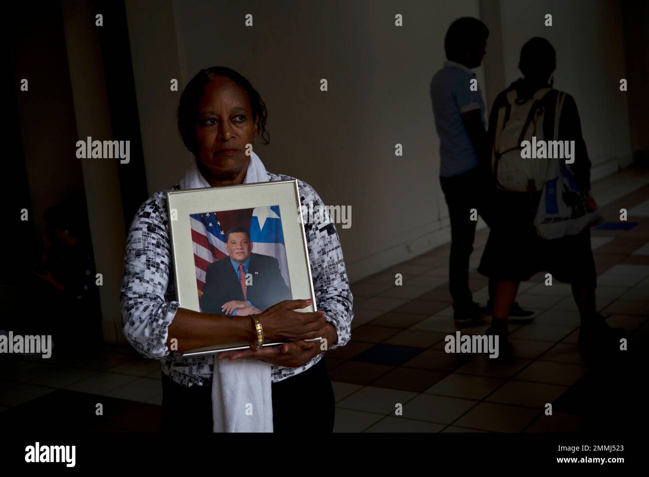 In this Sept. 4, 2018 photo, Gloria Rosado Ortiz poses with an image of ...