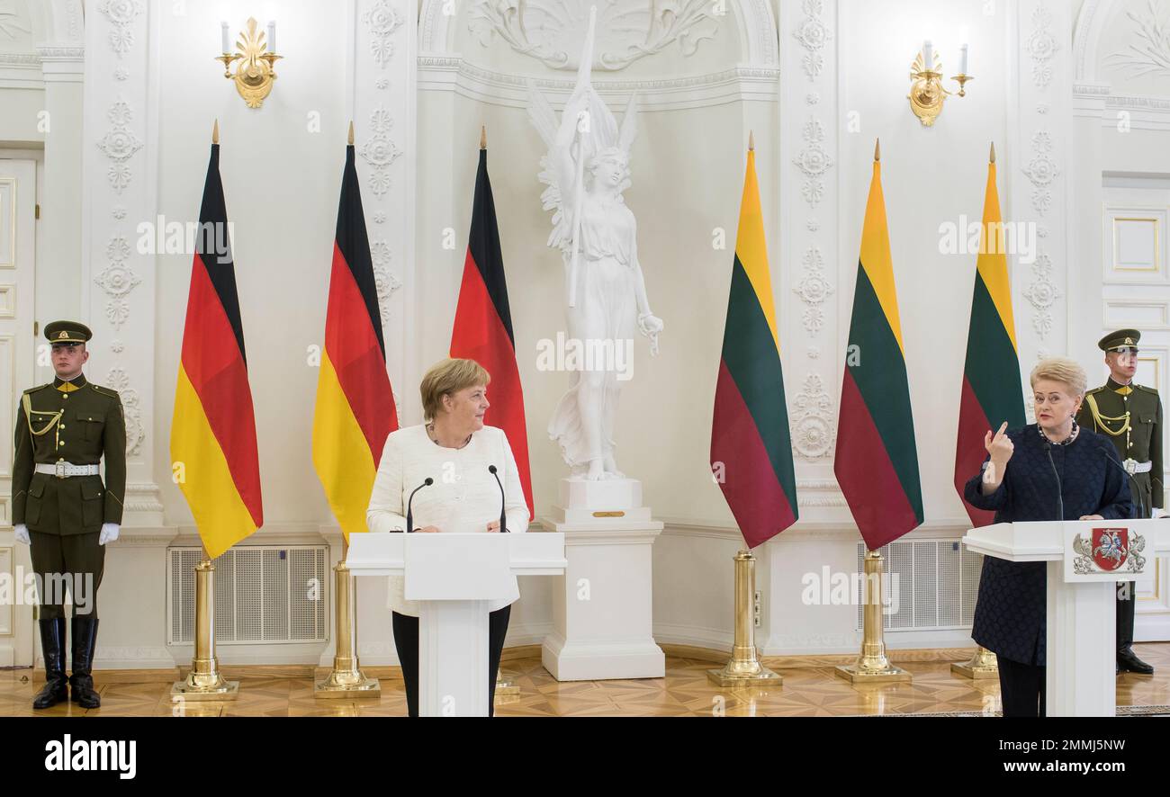 Lithuania's President Dalia Grybauskaite, right, speaks as German ...