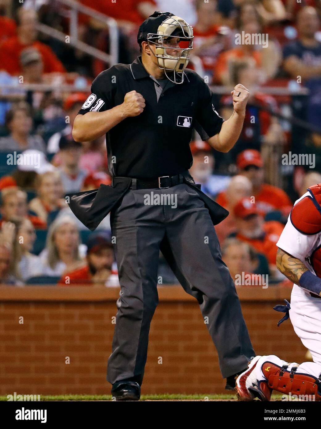 Home plate umpire Quinn Wolcott calls a batter out on strikes during a ...