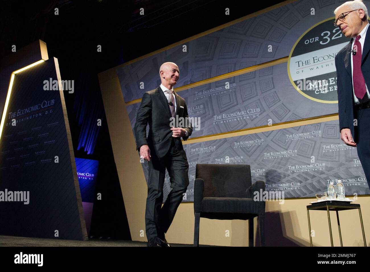 Jeff Bezos, Amazon founder and CEO, left, and David Rubenstein ...