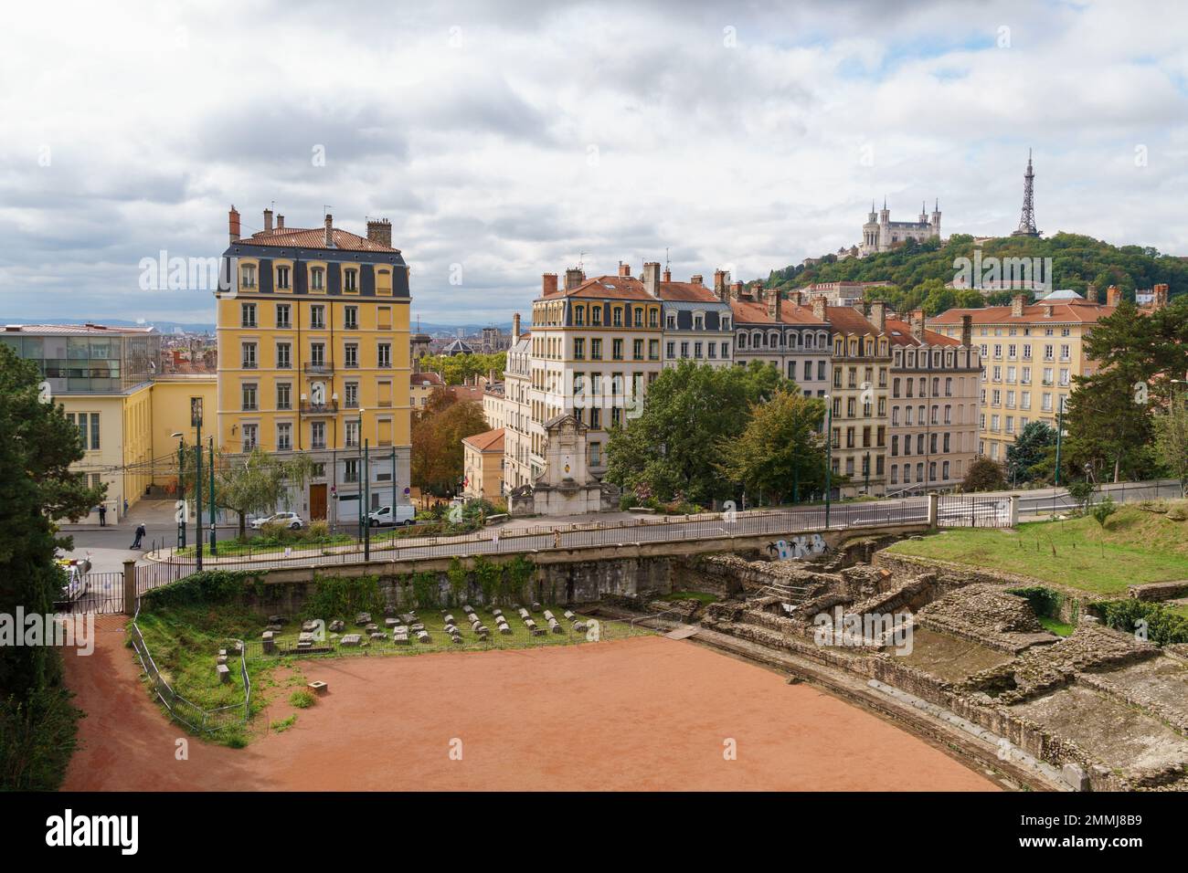 Ruins of a roman ampitheatre in Lyon France with La Basilique Notre ...