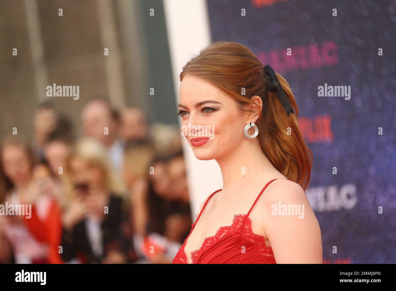 Actress Emma Stone poses for photographers at the World premiere of the ...