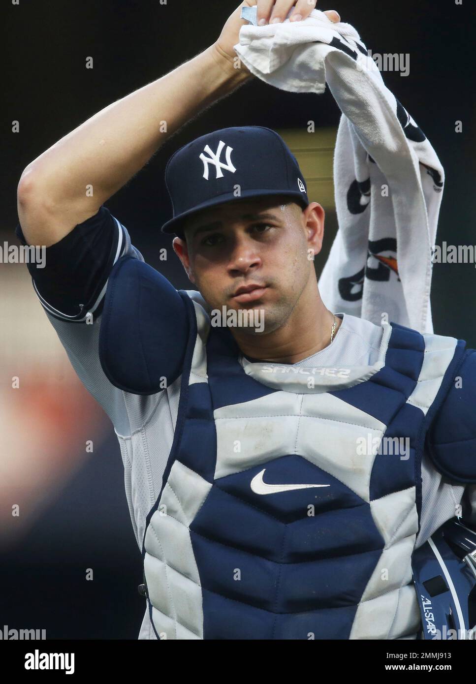 New York Yankees catcher Gary Sanchez heads to the dugout to catch ...