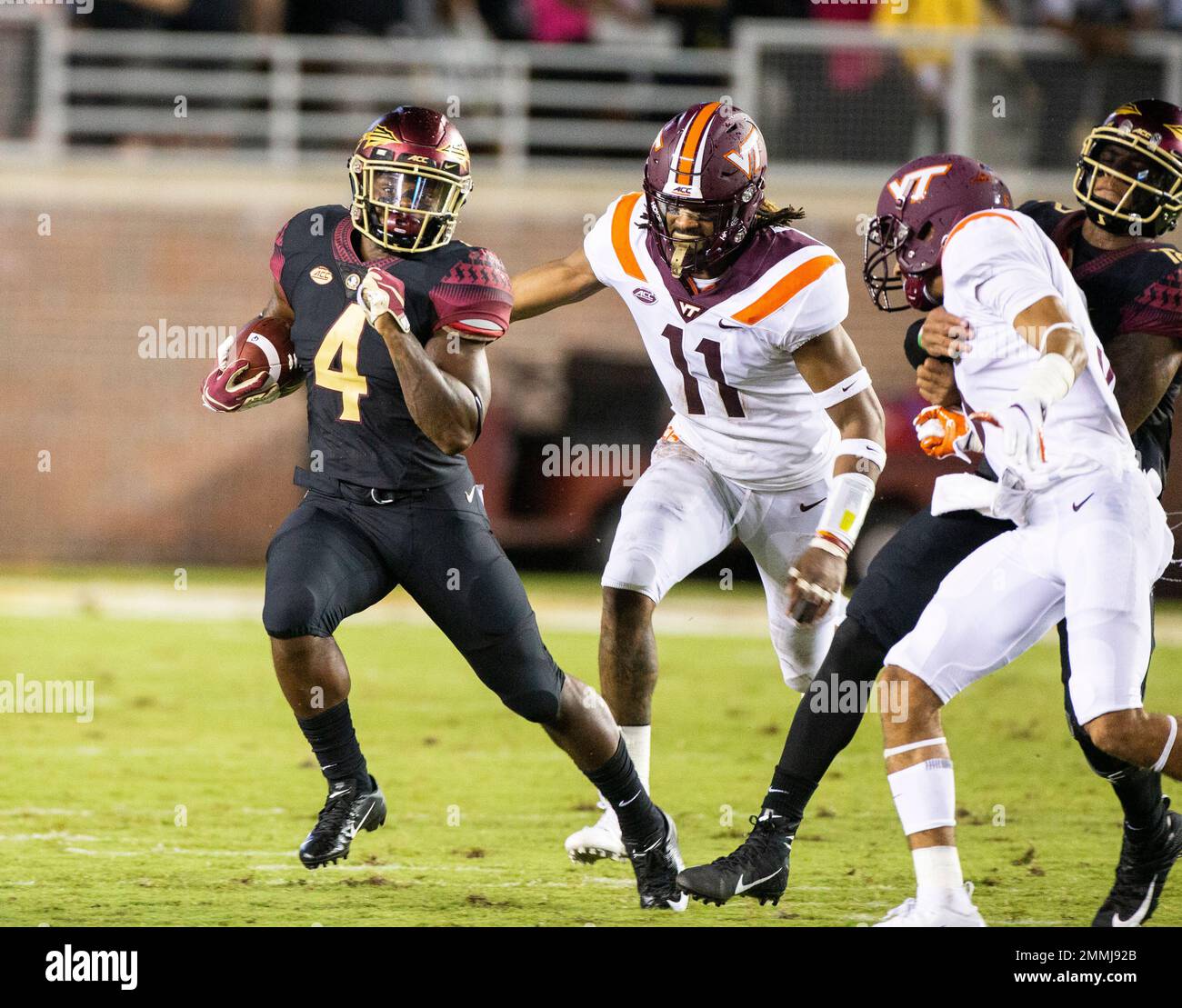 Florida State running back Khalan Laborn (4) runs away from the ...