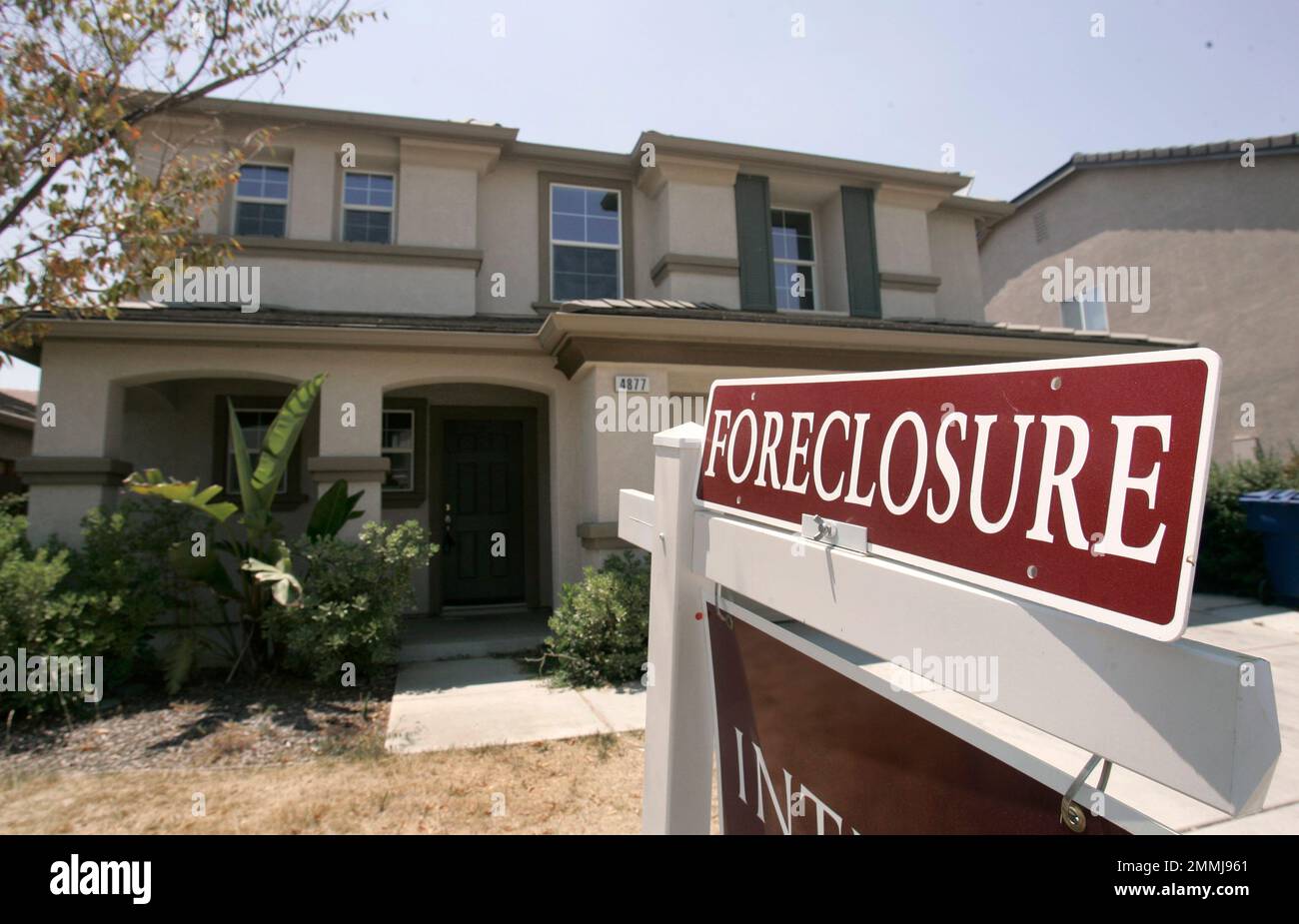 FILE- This July 2, 2008, file photo shows a foreclosed home in ...