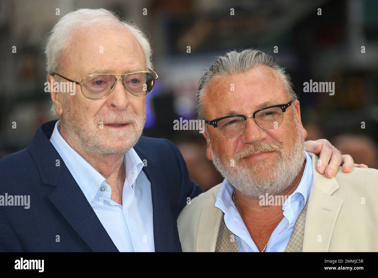 Sir Michael Caine and Ray Winstone pose for photographers upon arrival ...