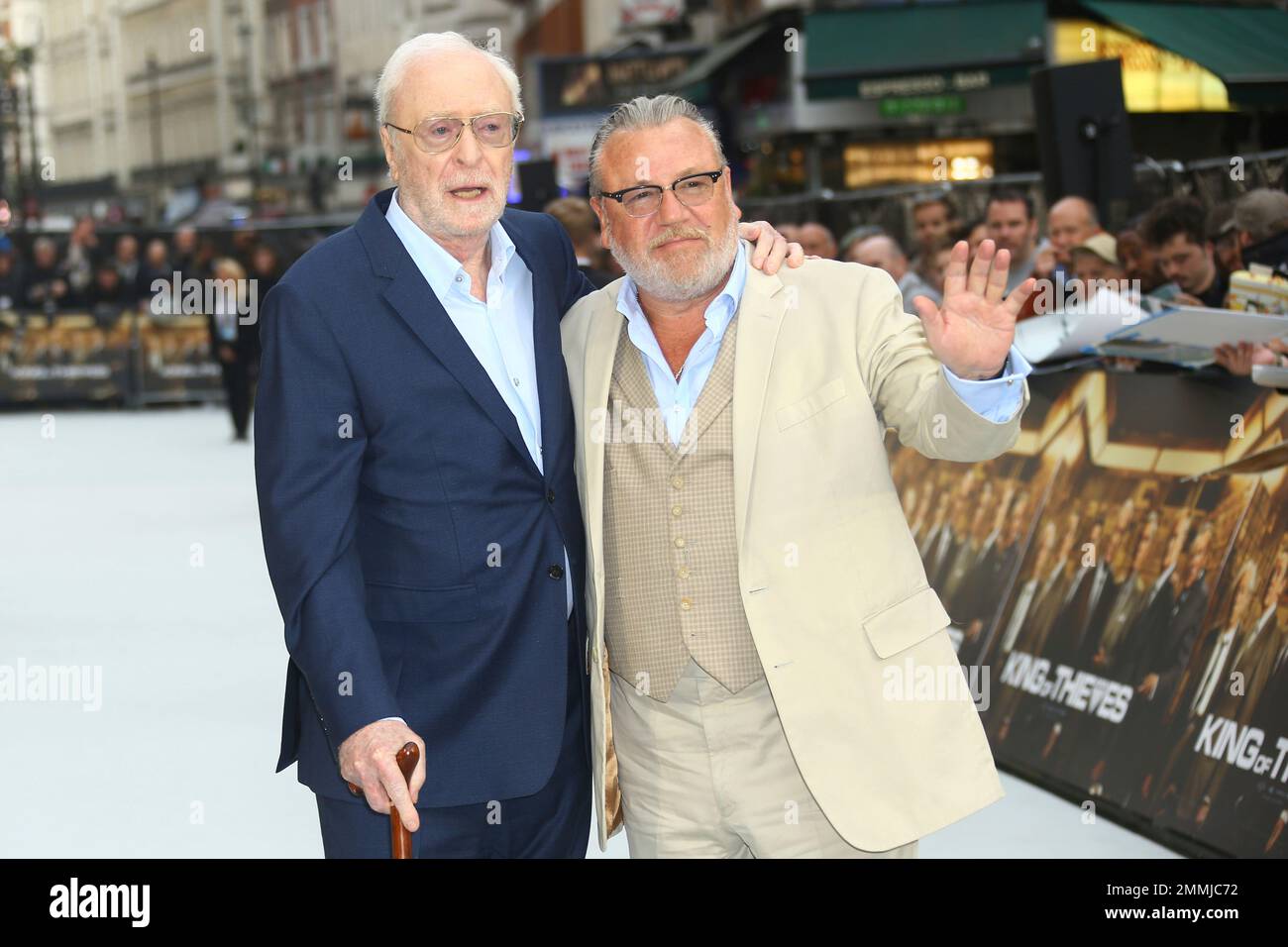 Sir Michael Caine and Ray Winstone pose for photographers upon arrival ...